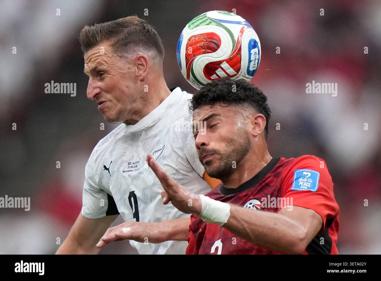 New Zealand's Chris Wood (9) and Egypt's Yasser Ibrahim (2) vie for the ...