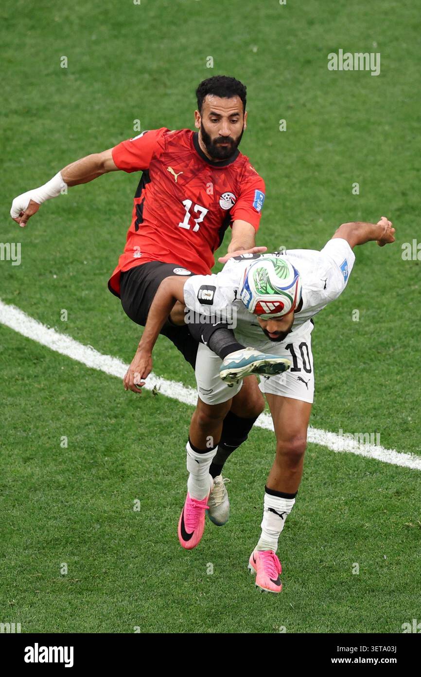 New Zealand's Sarpreet Singh (10) gets kicked by Egypt's Mohanad Lashin ...