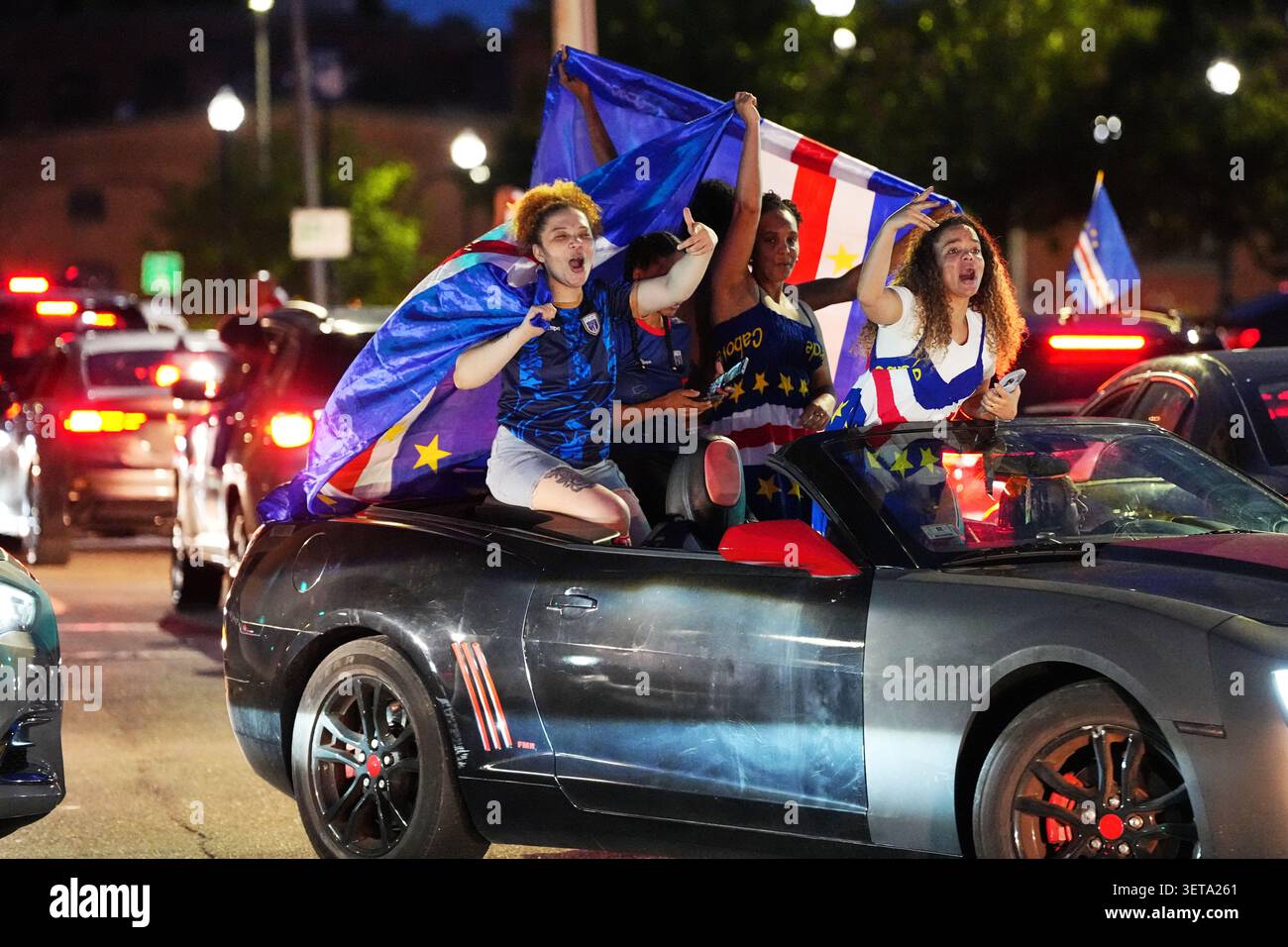Cape Verde supporters celebrate in cars on the streets after the World ...