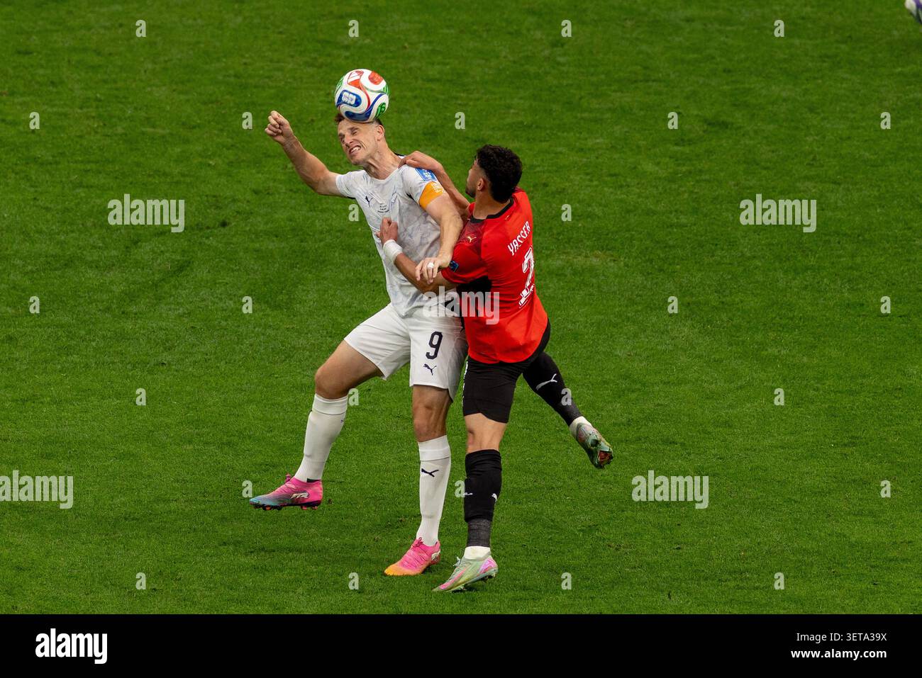 Egypt's Yasser Ibrahim (2) challenges New Zealand's Chris Wood (9 ...