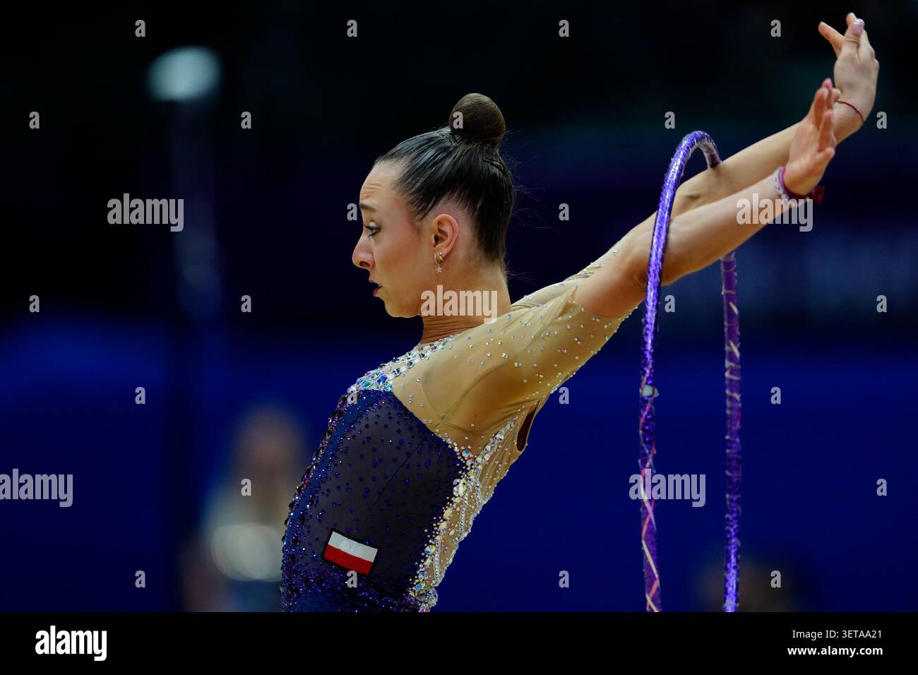 Emilia Heichel of Poland performs her hoop routine during Individual ...