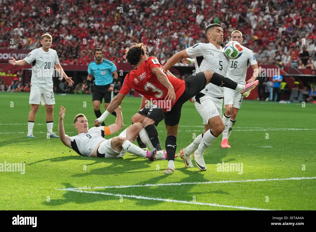 Egypt's Mohamed Hany (3) and New Zealand's Michael Boxall (5) vie for ...