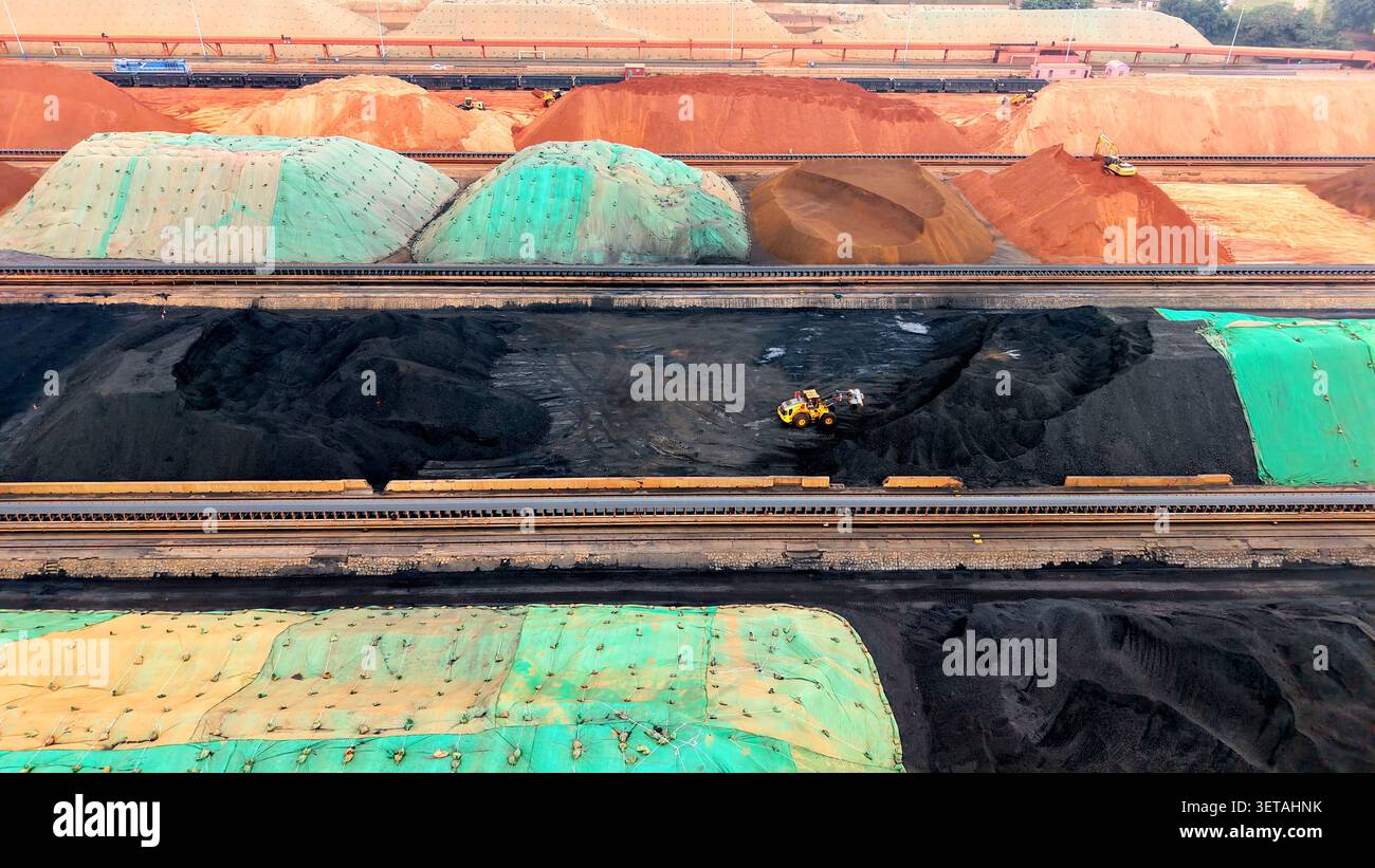 QINGDAO, CHINA - JUNE 22, 2026 - Construction machinery is sorting and ...
