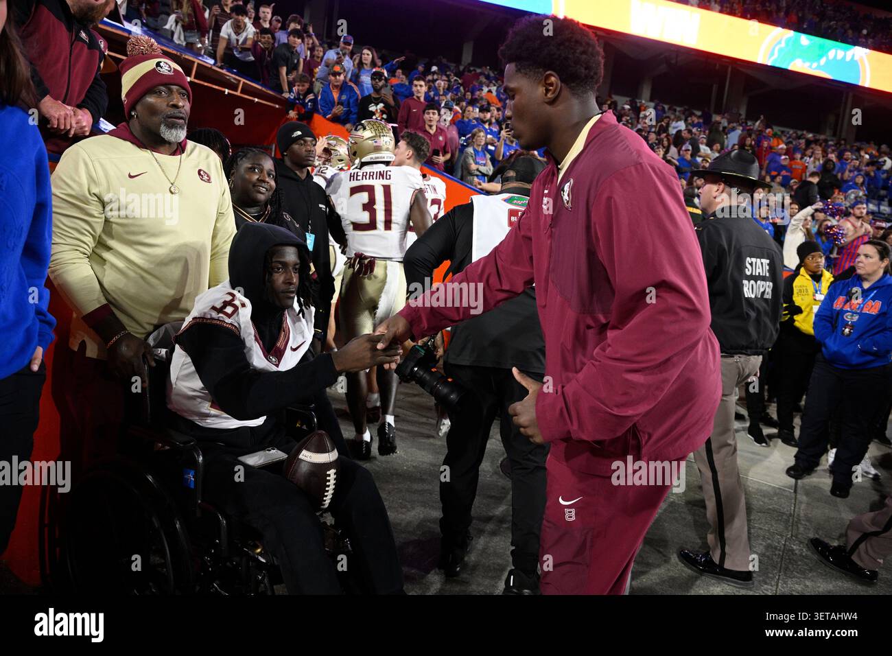 Florida State linebacker Ethan Pritchard (35) greets defensive lineman ...