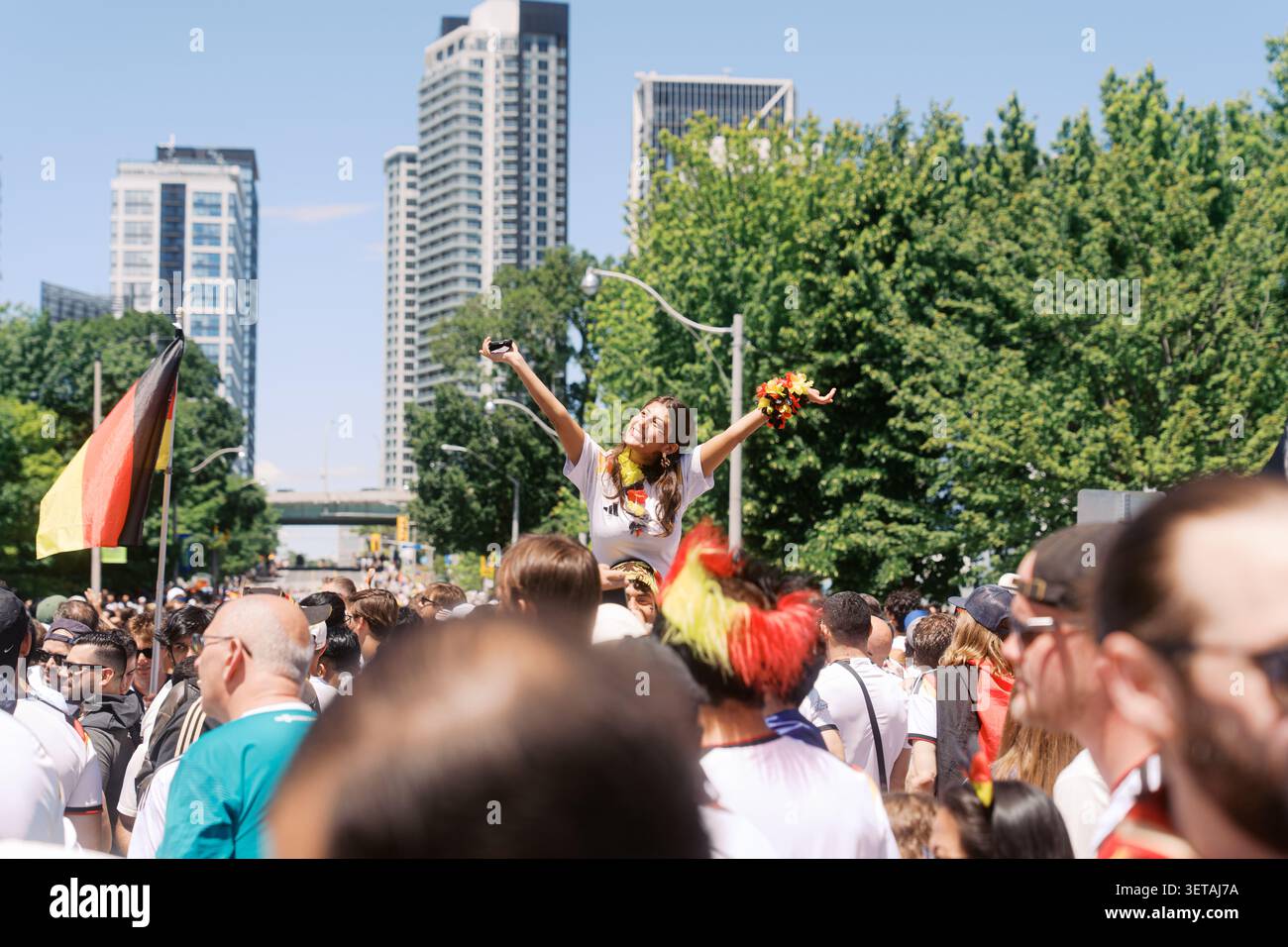 Toronto, Canada - June 20, 2026: German soccer fans celebrate in crowd ...