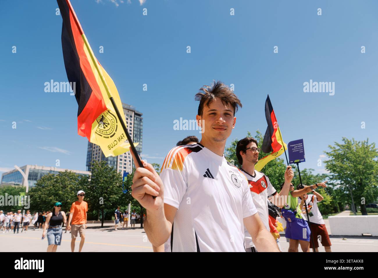 Toronto, Canada - June 20, 2026: German soccer fans with flags walk to ...