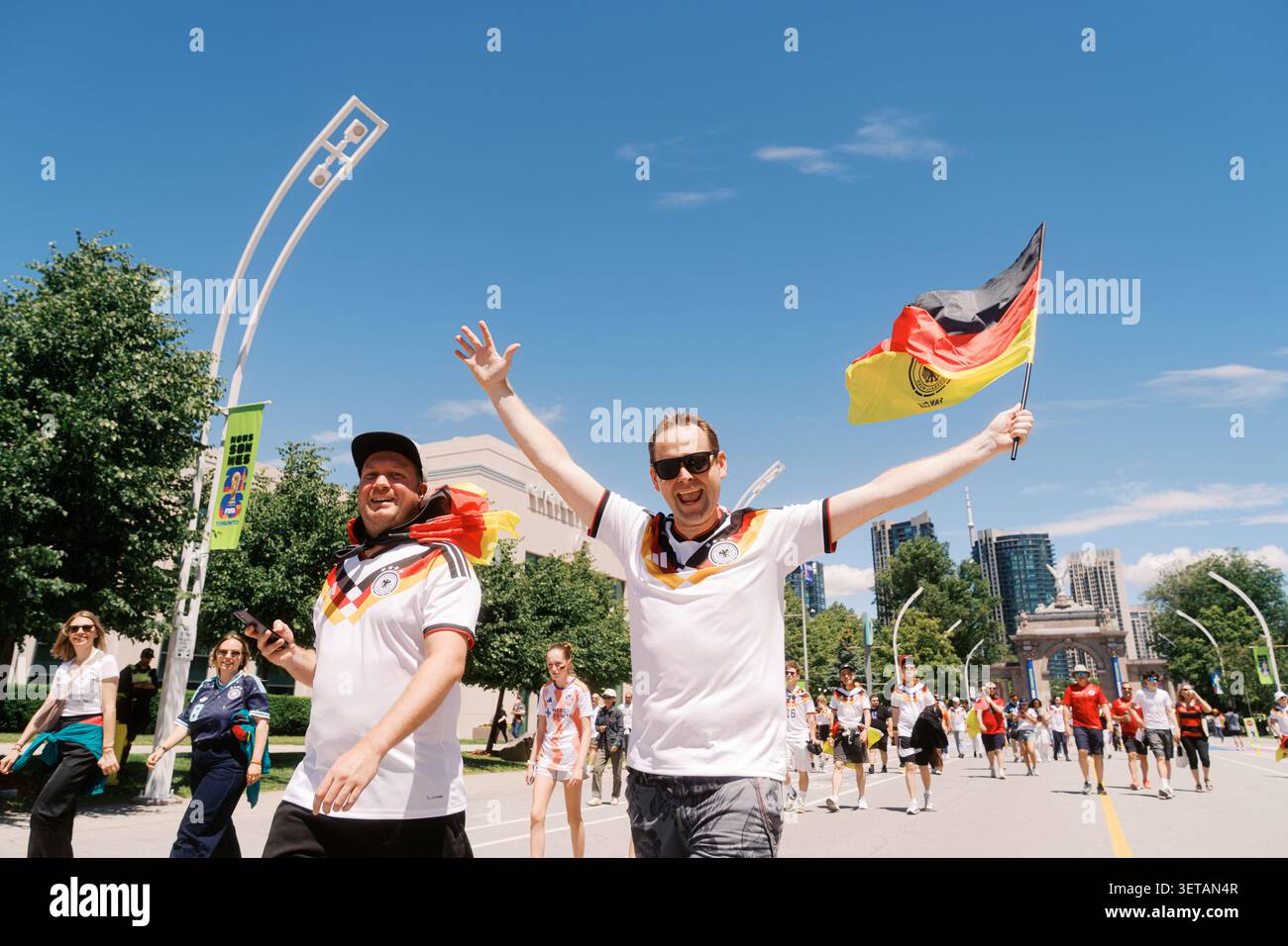 Toronto, Canada - June 20, 2026: German soccer fans celebrate with flag ...