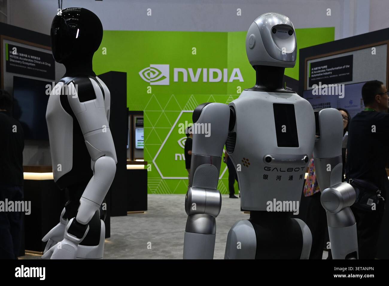 22 June 2026, China, Peking: Humanoid robots are on display at the ...