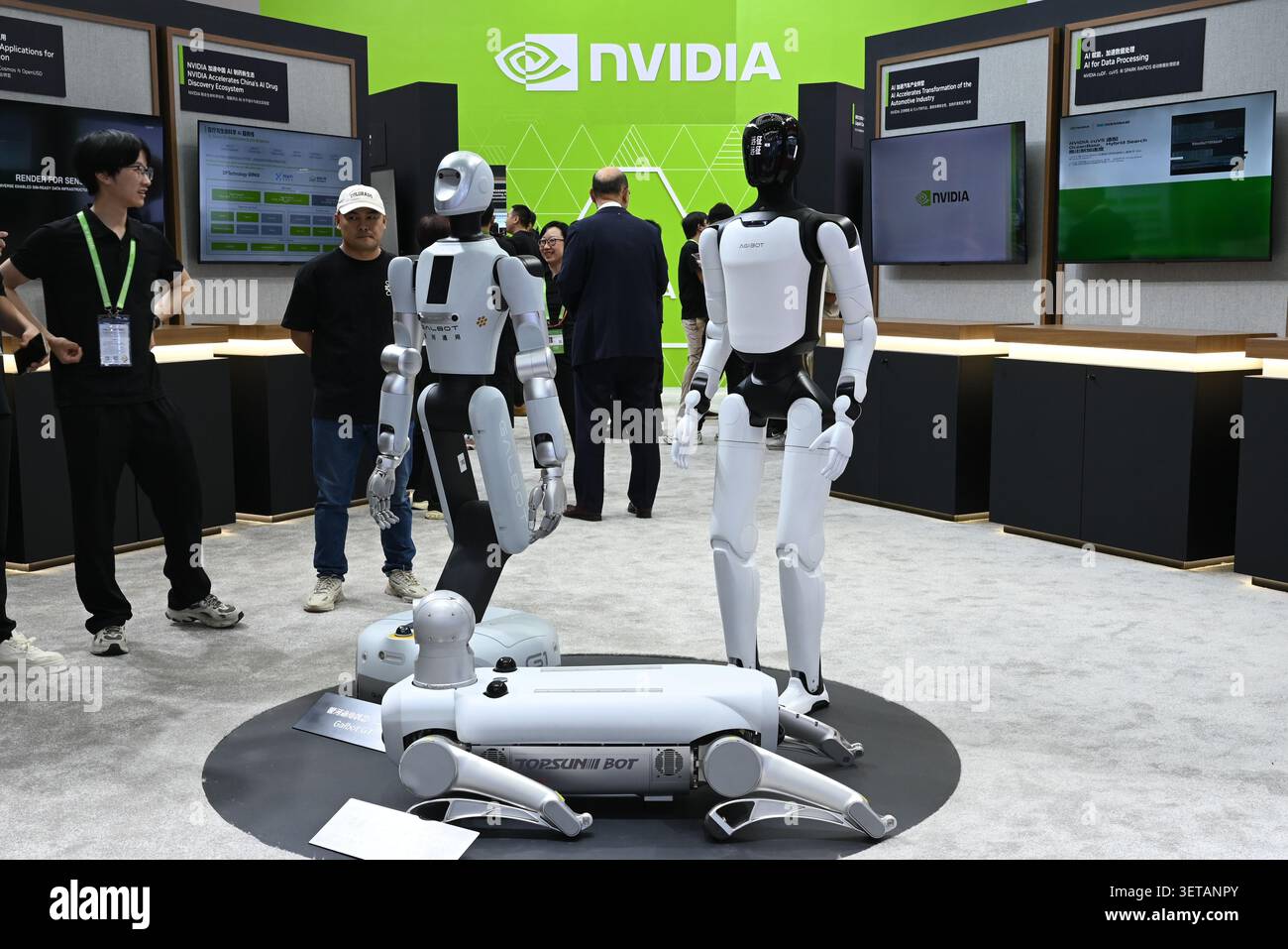 22 June 2026, China, Peking: Humanoid robots are on display at the ...