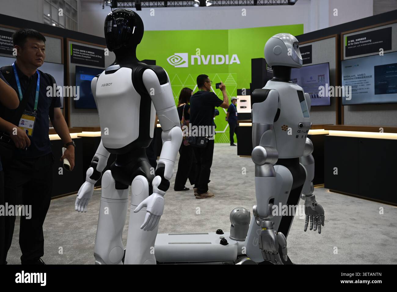 22 June 2026, China, Peking: Humanoid robots are on display at the ...