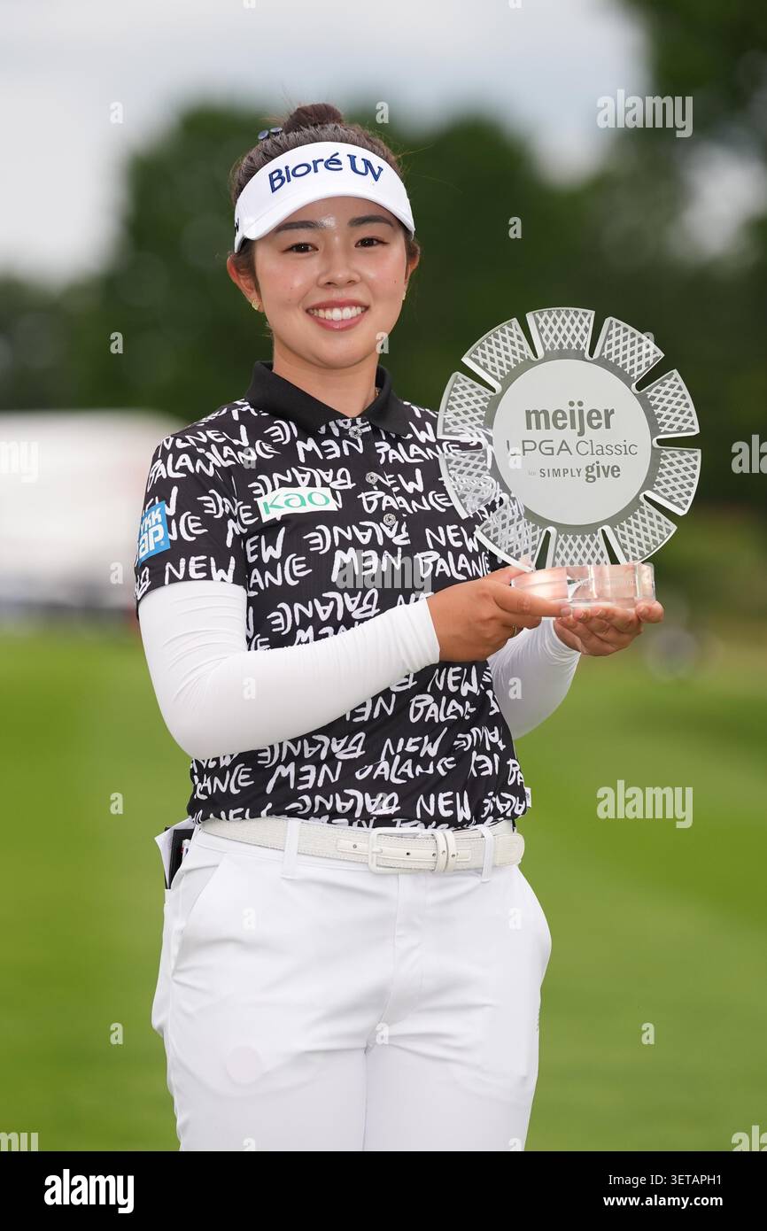 Miyu Yamashita of Japan poses with the victor's trophy after winning ...