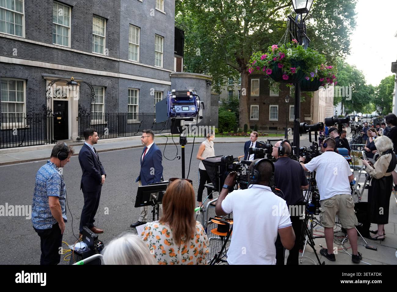 Members of the media gathered outside number 10 Downing Street ...