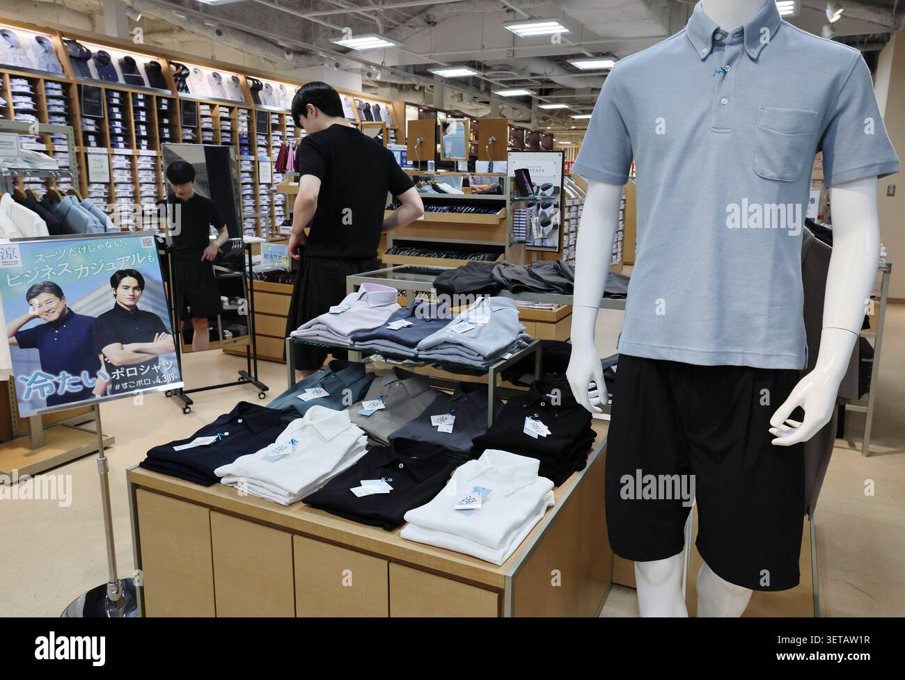 Summer casual wear section is set up at men's clothing store in Osaka ...