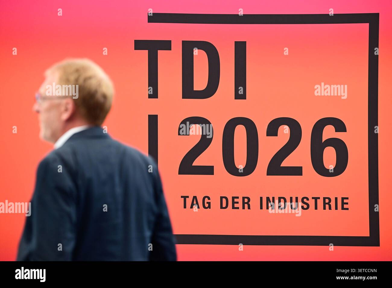 22 June 2026, Berlin: "TDI 2026 Industry Day" is written on a wall ...