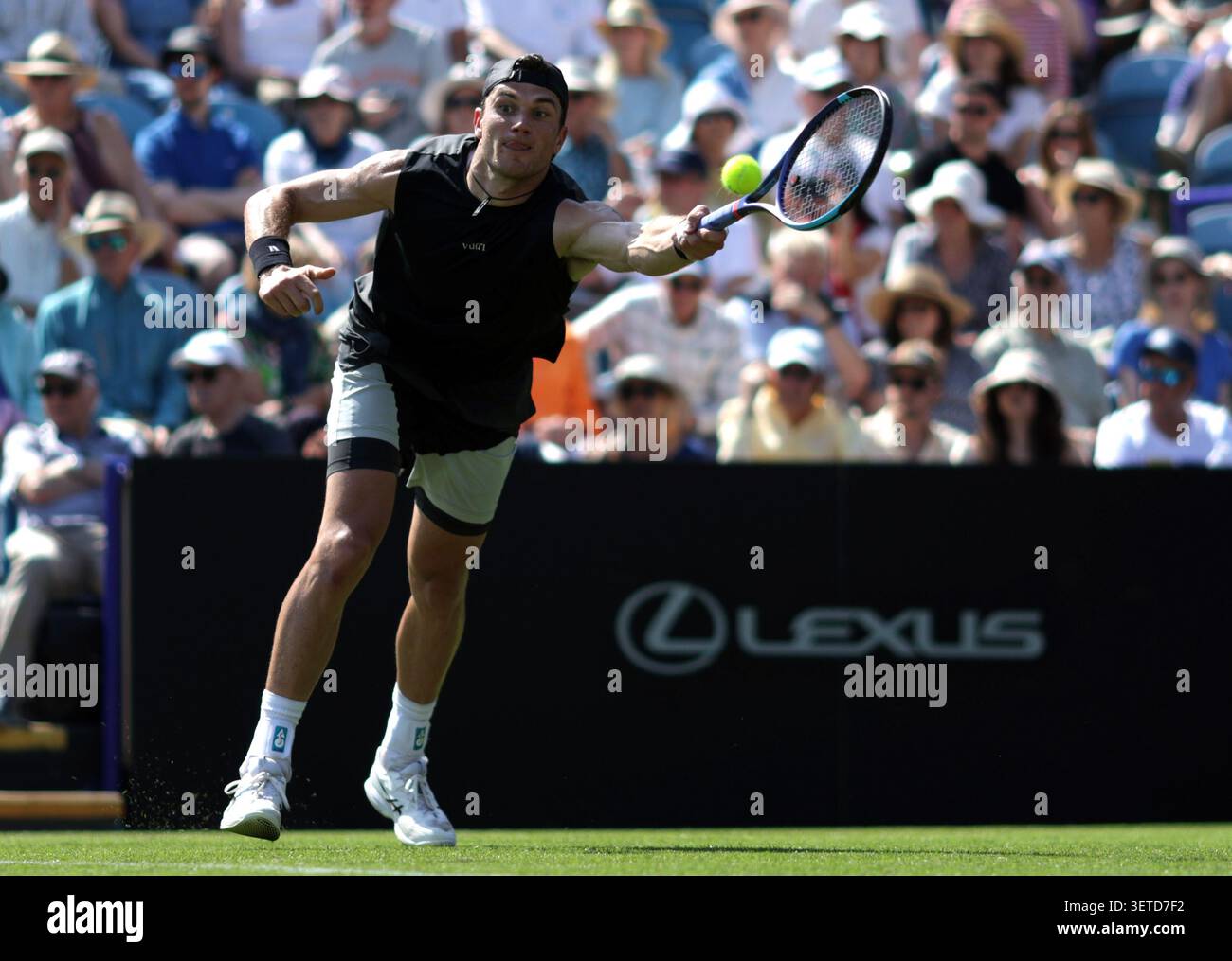 Jack Draper of Great Britain slips over in his match against Marcos ...
