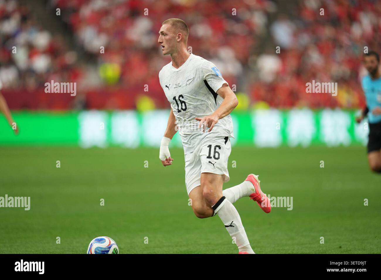 New Zealand's Finn Surman (16) controls the ball during the World Cup ...