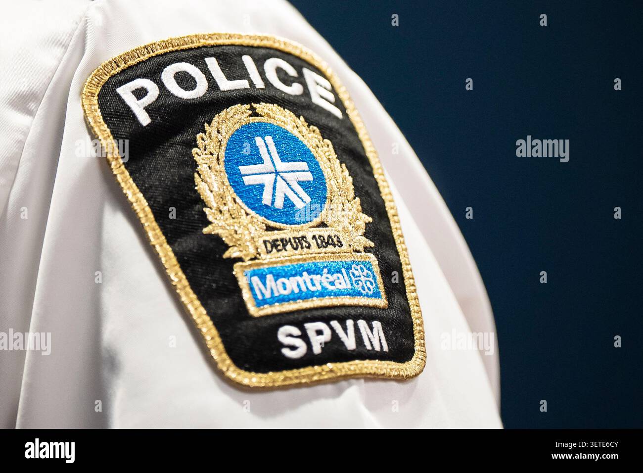 A Montreal police badge is seen during a press conference in Montreal ...