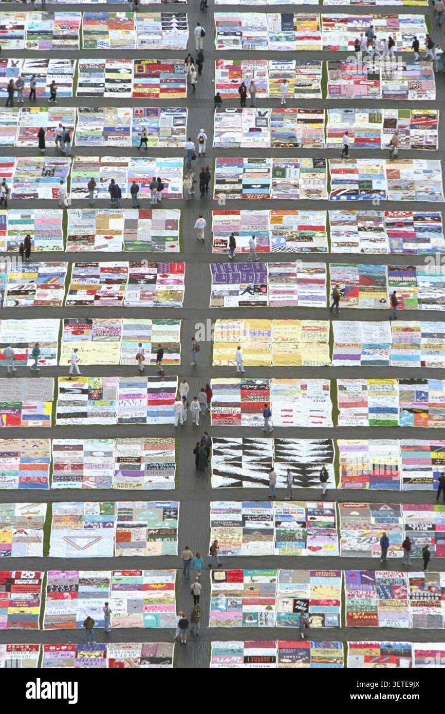 FILE — Visitors wander amid the panels of the AIDS Quilt on the Mall In ...