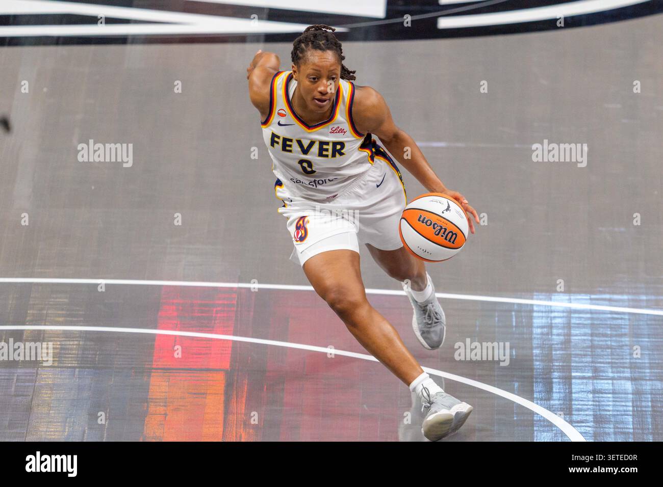 ATLANTA, GA - JUNE 20: Kelsey Mitchell #0 of the Indiana Fever dribbles ...