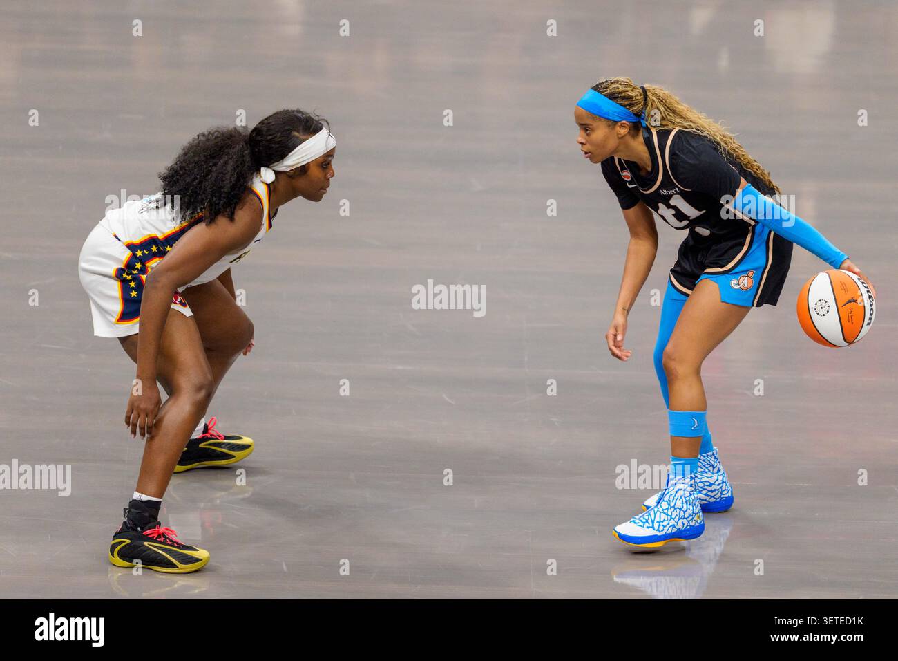 ATLANTA, GA - JUNE 20: Raven Johnson #3 of the Indiana Fever defends ...