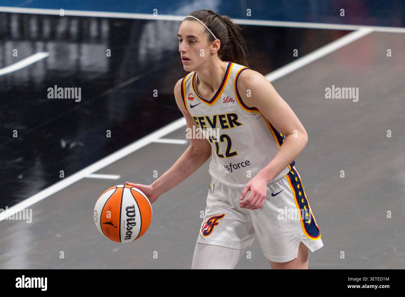 ATLANTA, GA - JUNE 20: Caitlin Clark #22 of the Indiana Fever dribbles ...