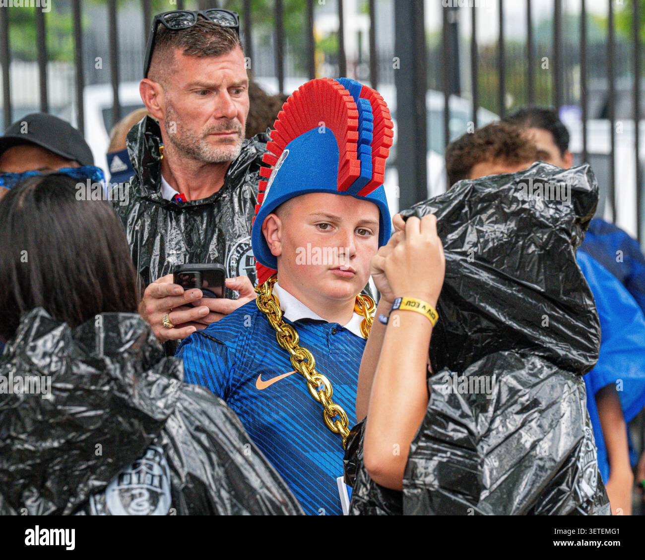 Fans arrive at Philadelphia Stadium for the France vs. Iraq match ...