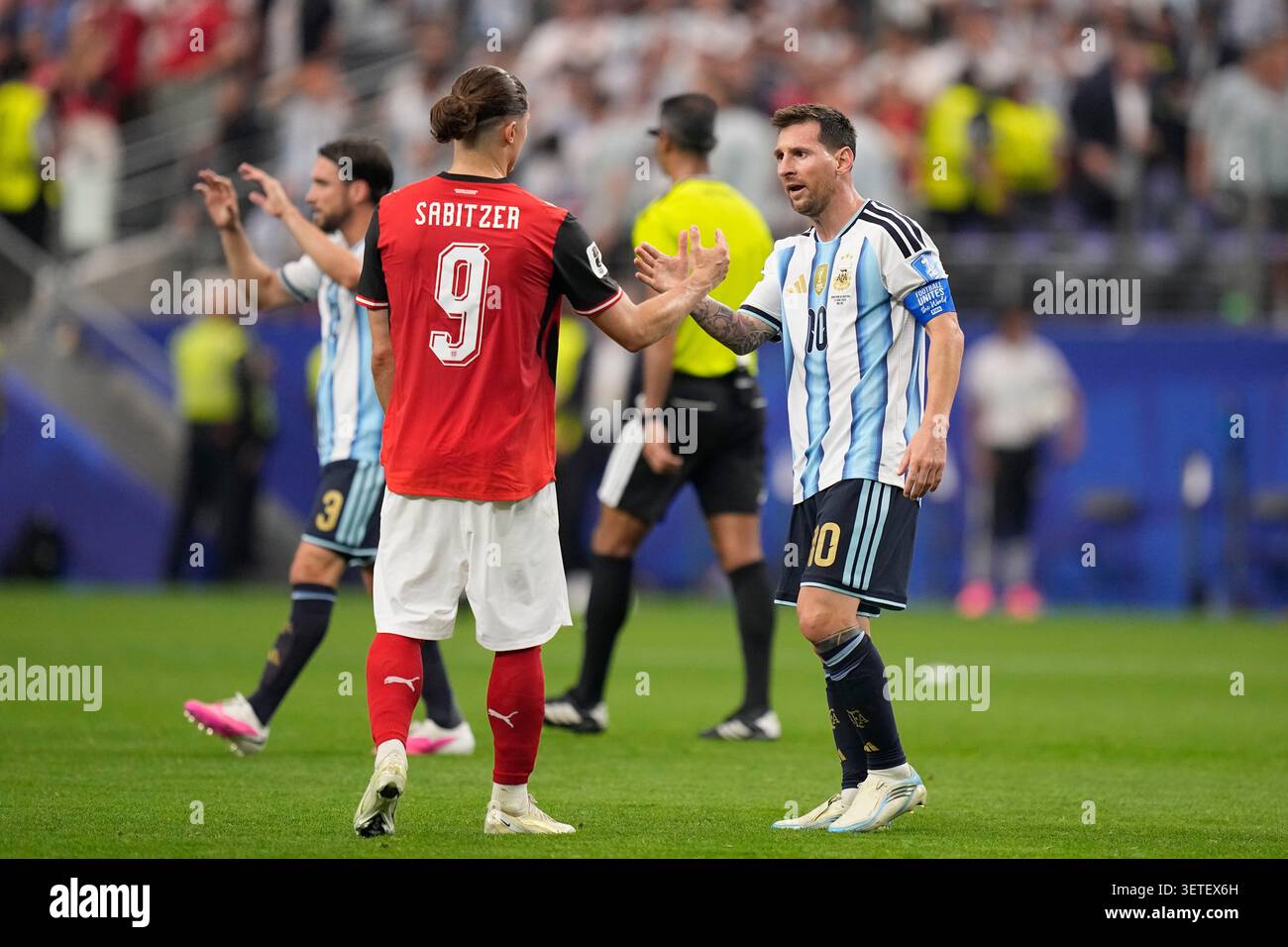 Argentina's Lionel Messi (10) shakes hands with Austria's Marcel ...