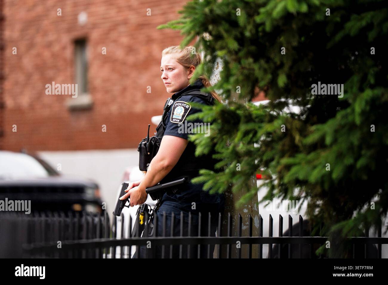 Montreal police work the scene of a shooting in Montreal, Monday, June ...