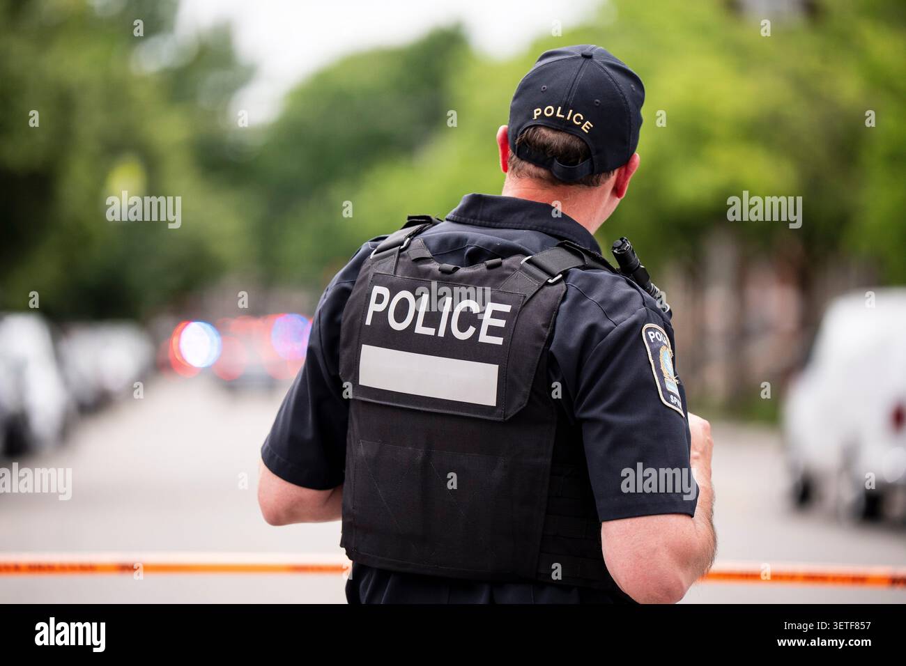 Montreal police work the scene of a shooting in Montreal, Monday, June ...