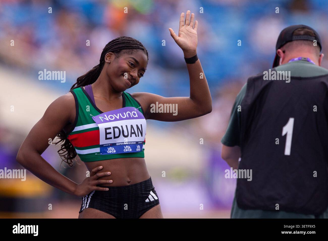 Success Eduan waves for the crowd ahead of the Womens 200m heat at the ...