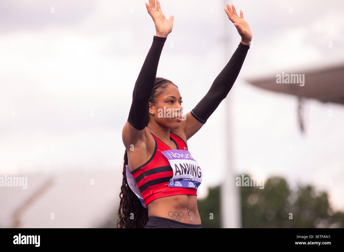 Amber Anning waves to the crowd ahead of the Womens 400m final at the ...
