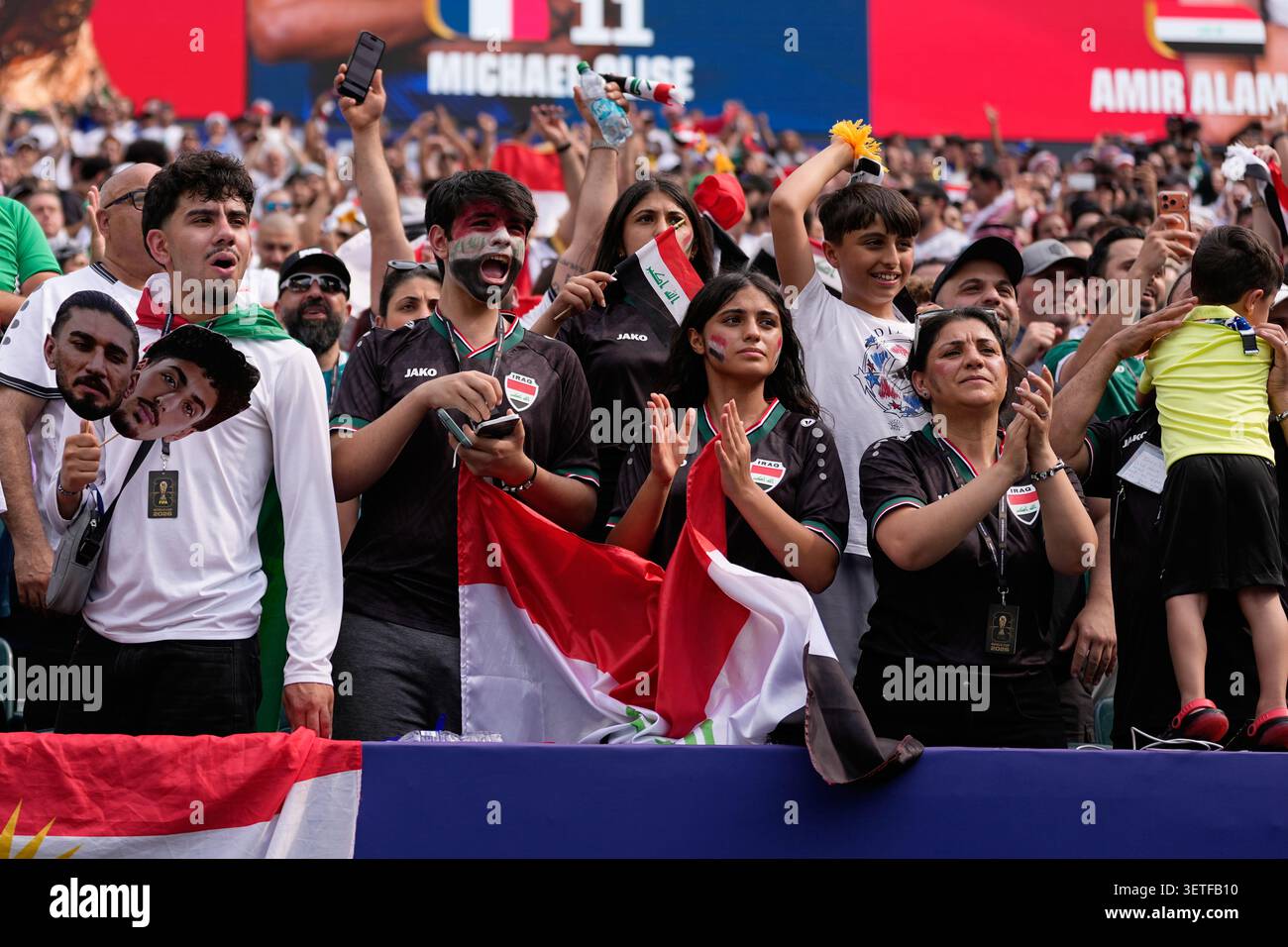Fans of Iraq cheer prior to the World Cup Group I soccer match between ...