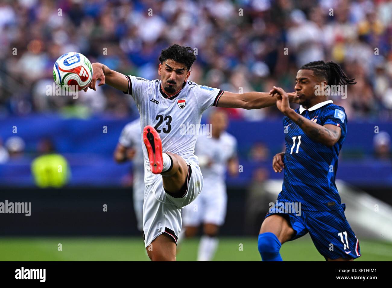 Michael OLISE of France and Merchass DOSKI of Iraq during the FIFA ...