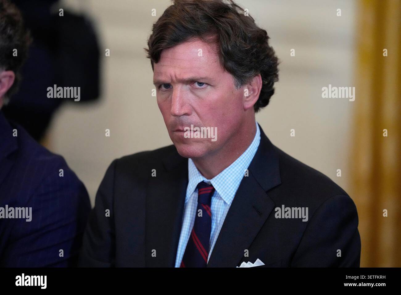 FILE - Tucker Carlson attends a meeting with President Donald Trump and ...