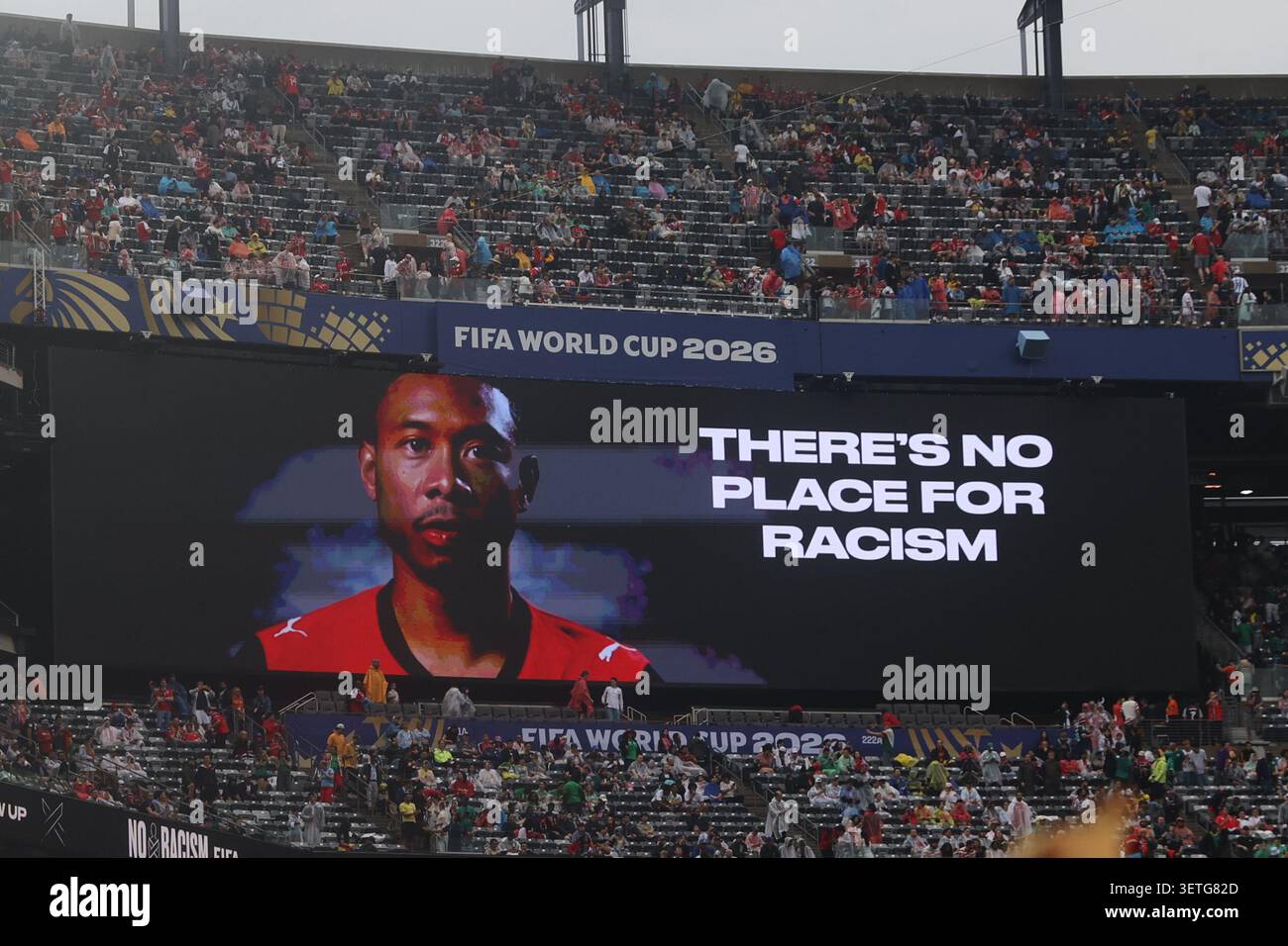 A screen displays an anti-racism message before the World Cup Group I ...
