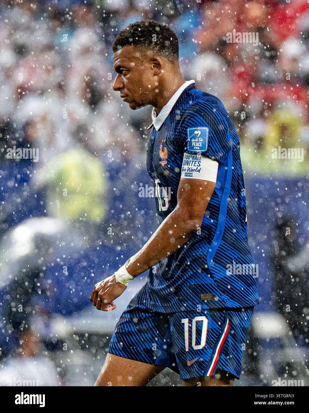 Kylian Mpappe of France in the rain during the France vs. Iraq World ...