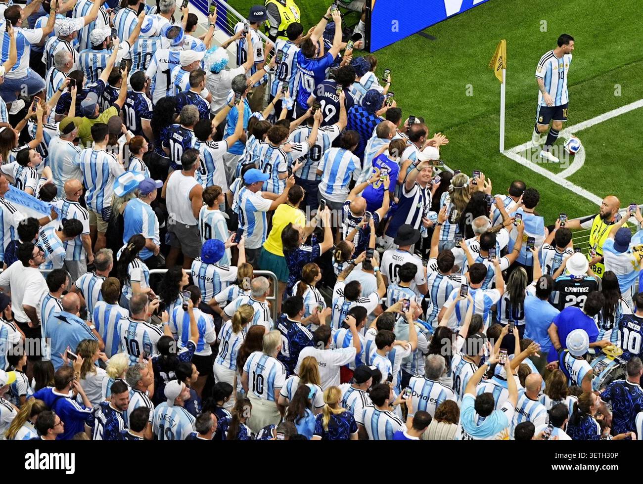 Argentina's Lionel Messi takes a corner kick during the second half of ...