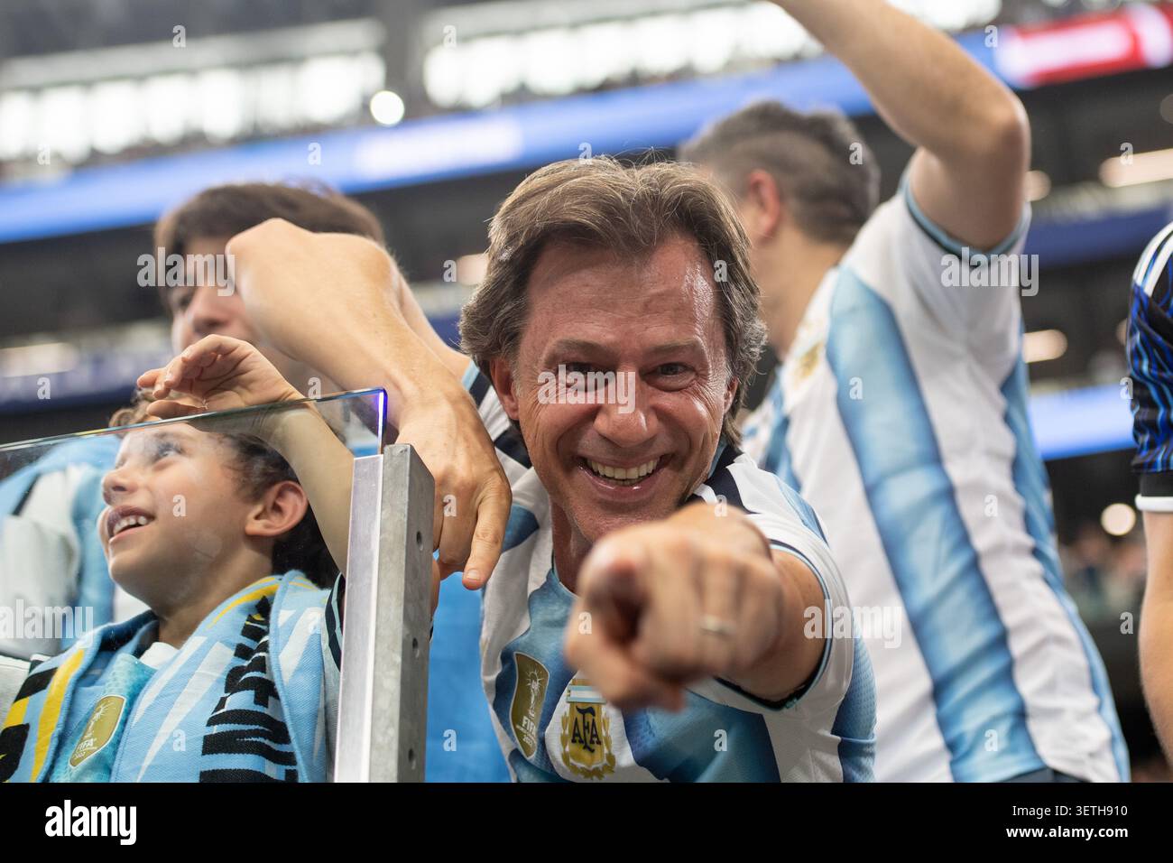 Argentine fans celebrate Argentina's victory over Austria in Group J of ...