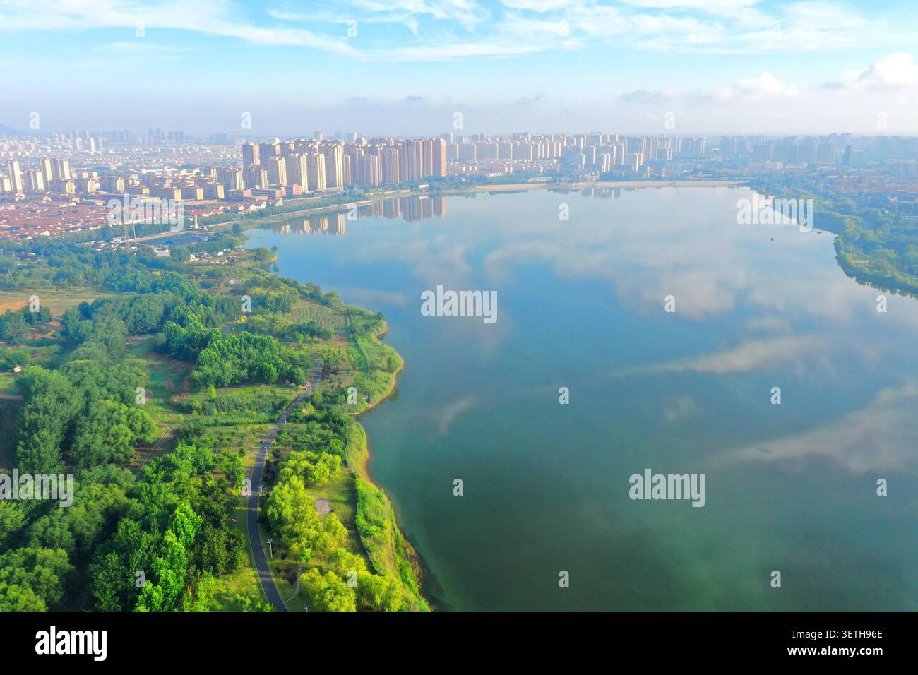 Workers improve water quality and shoreline environment through ...