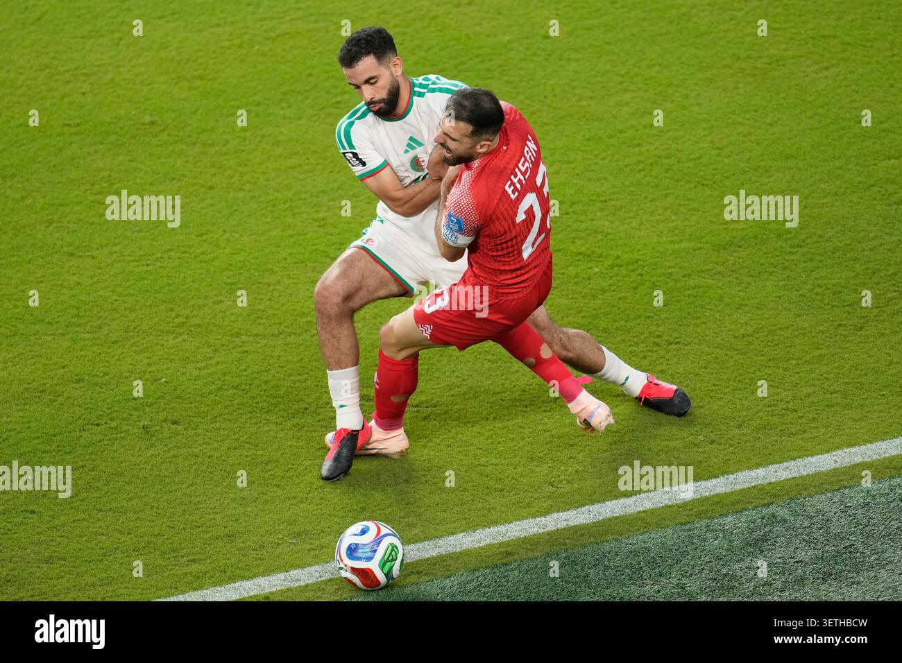 Algeria's Rayan Ait-Nouri, left, and Jordan's Ehsan Haddad compete for ...