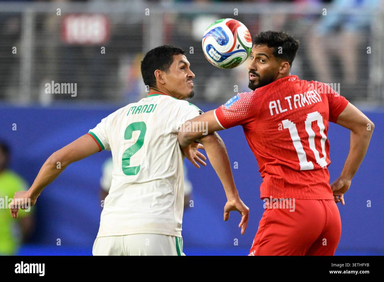 Algeria's Aissa Mandi, left, and Jordan's Mousa Altamari battle for the ...