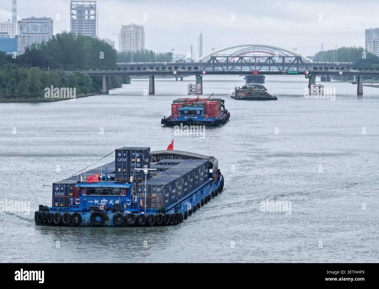 Ships carrying containers, coal, building materials and other goods ...