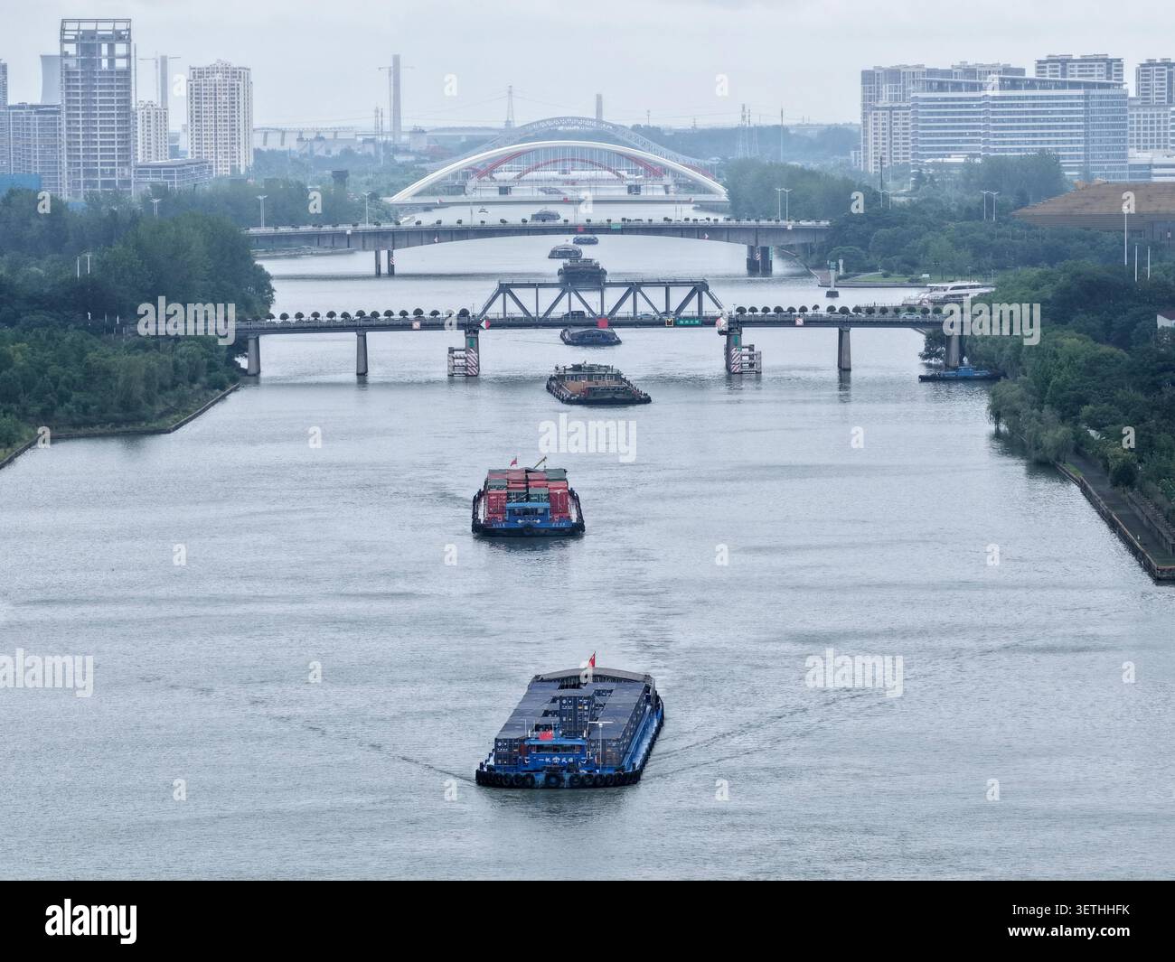 Ships carrying containers, coal, building materials and other goods ...
