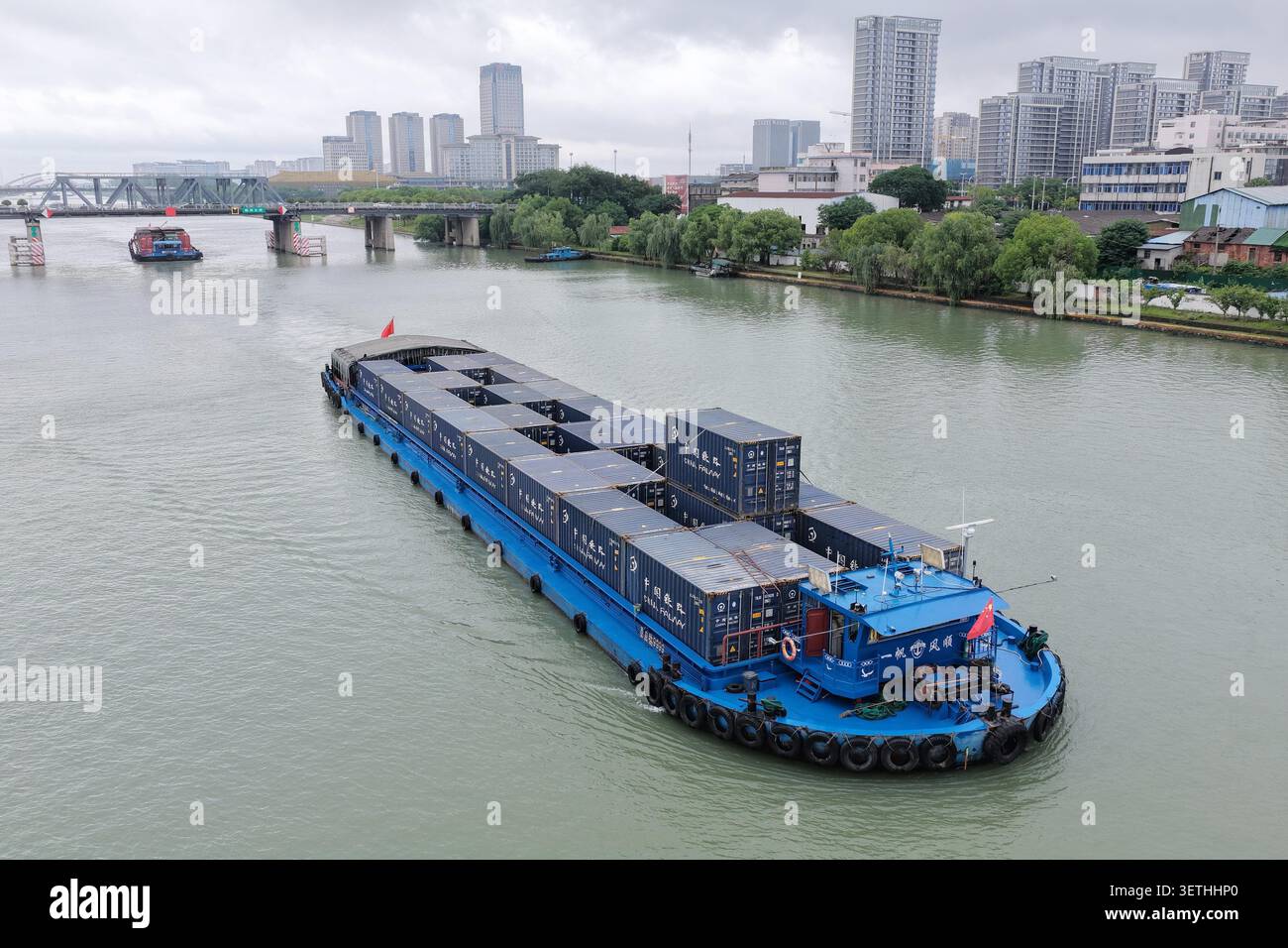 Ships carrying containers, coal, building materials and other goods ...
