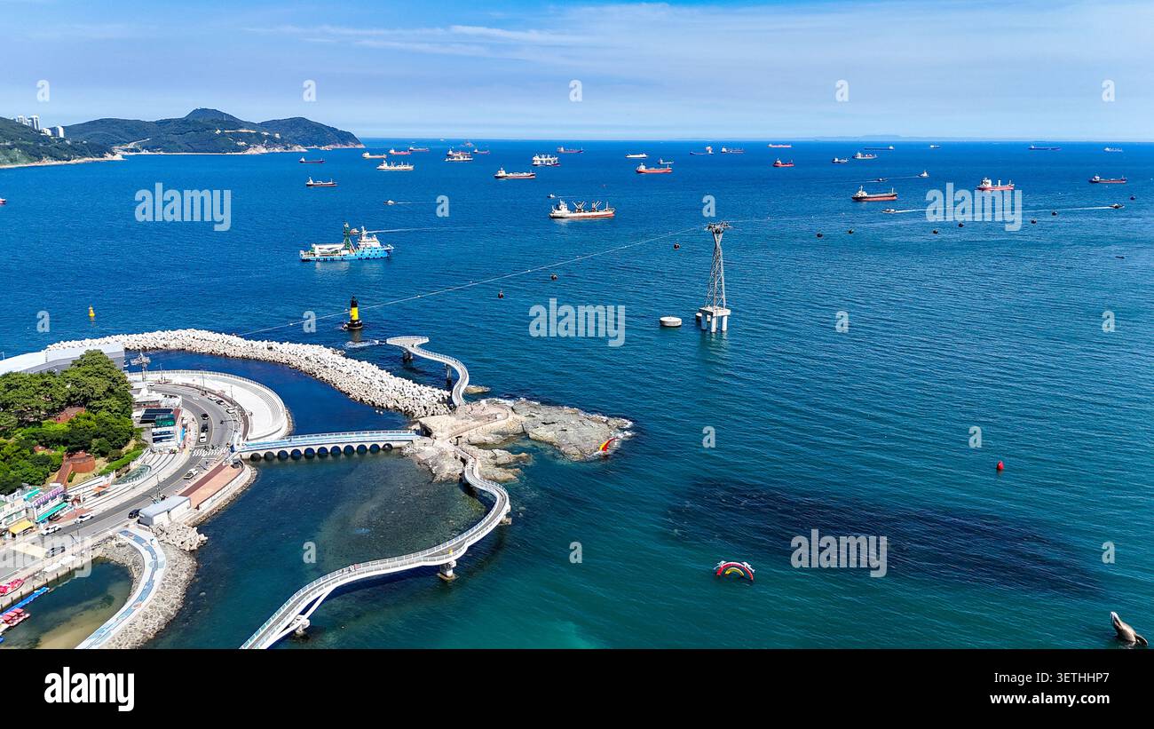 Busan's songdo cloud trails skywalk extending over the ocean, with a ...