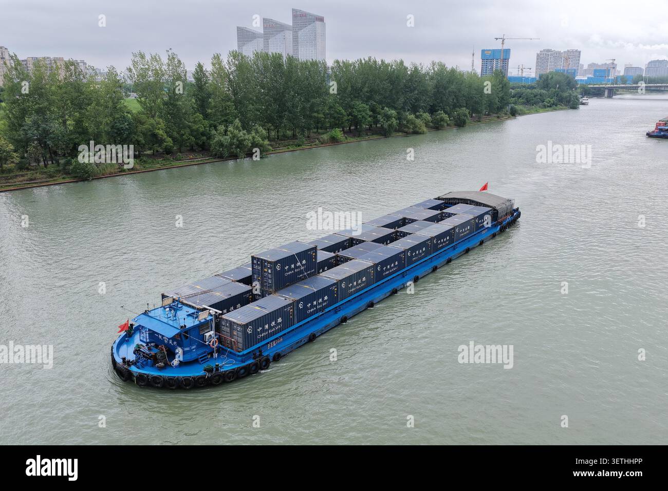 Ships carrying containers, coal, building materials and other goods ...