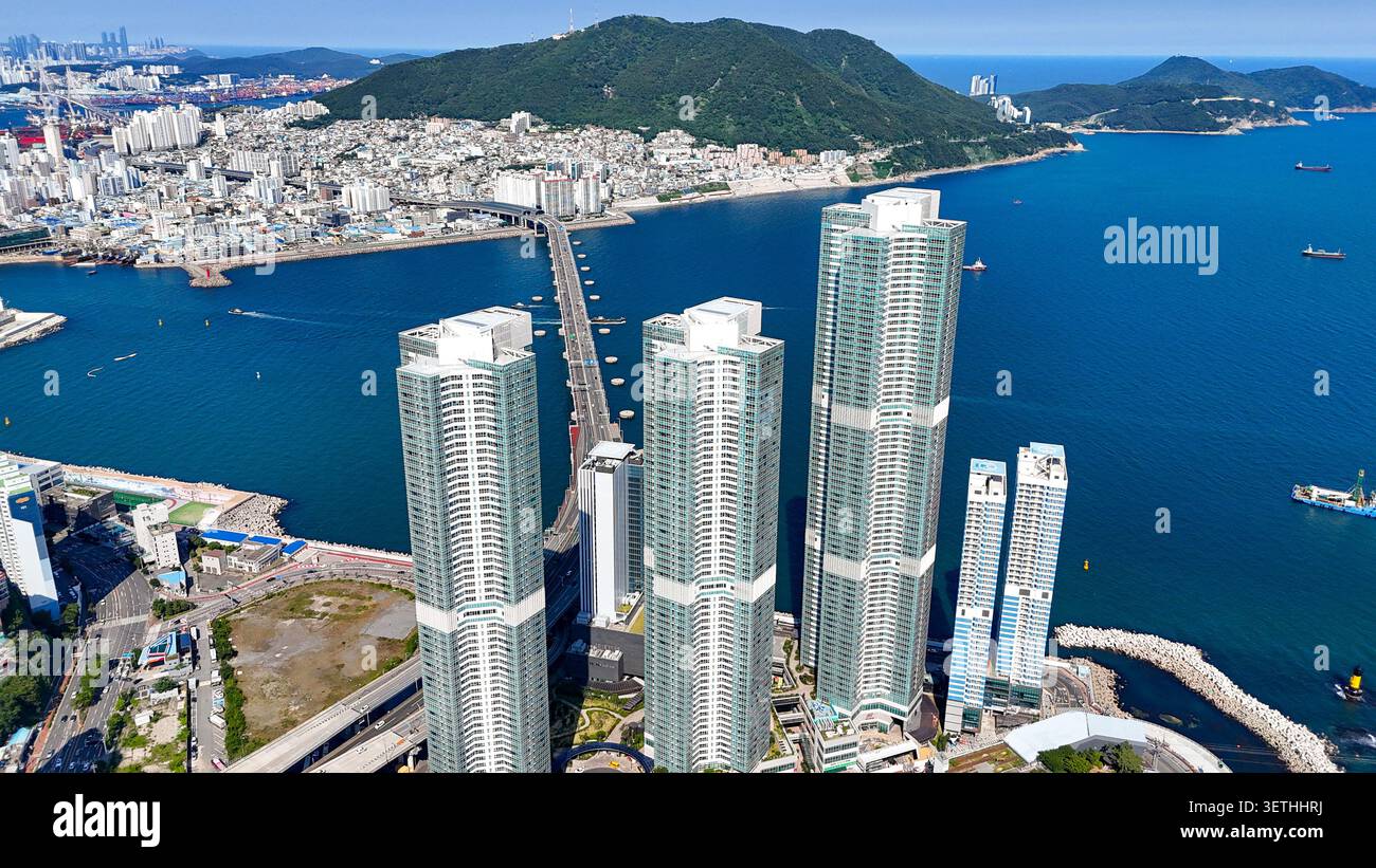 Aerial view showing namhang bridge spanning the deep blue sea ...