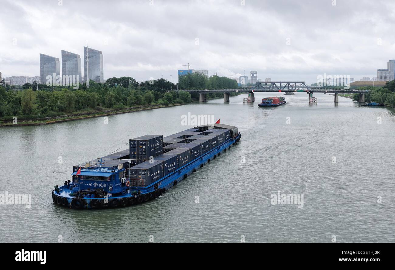 Ships carrying containers, coal, building materials and other goods ...