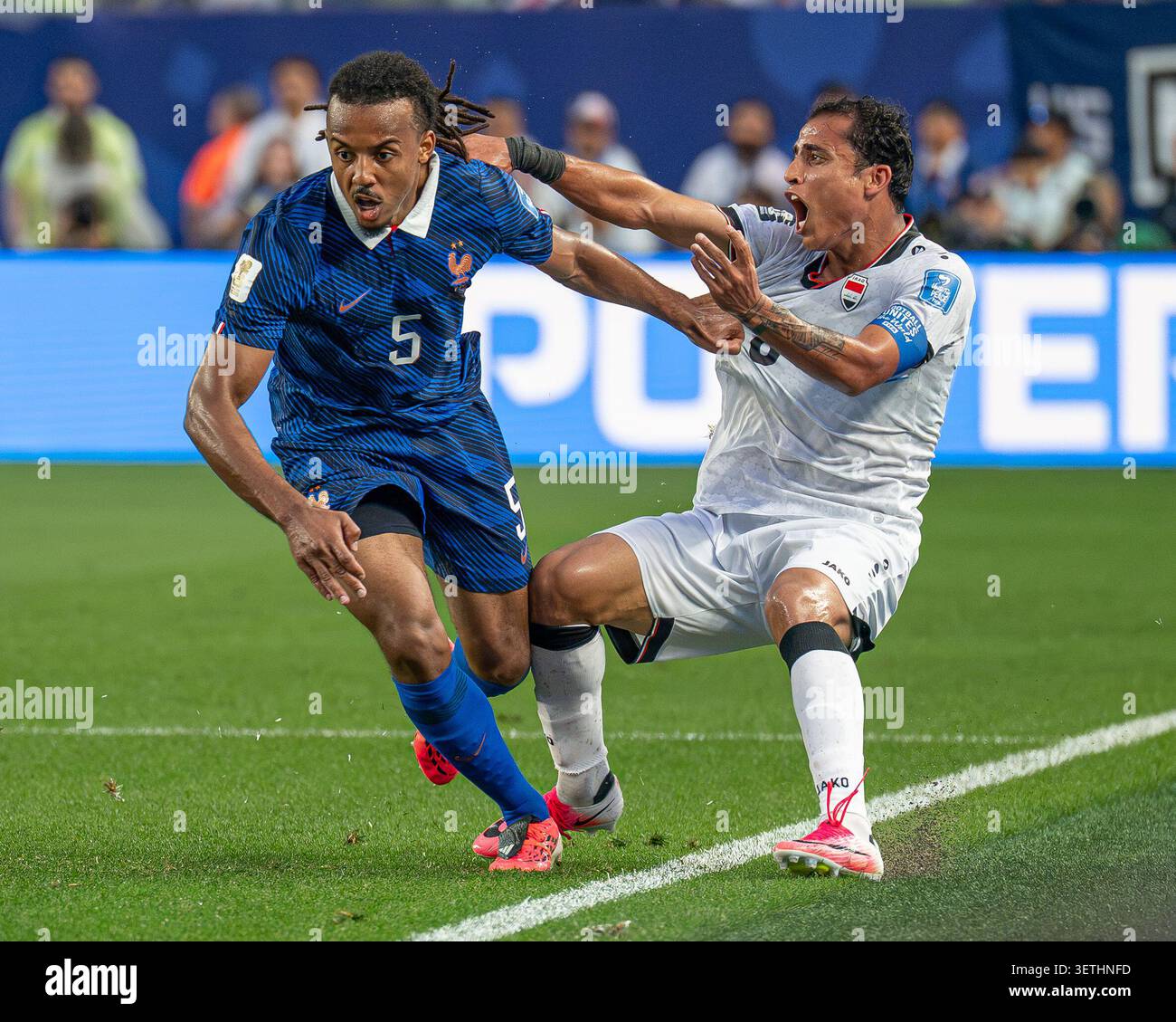 Physical play between Jules Kounde (#5) for France and Ibrahim Bayesh ...