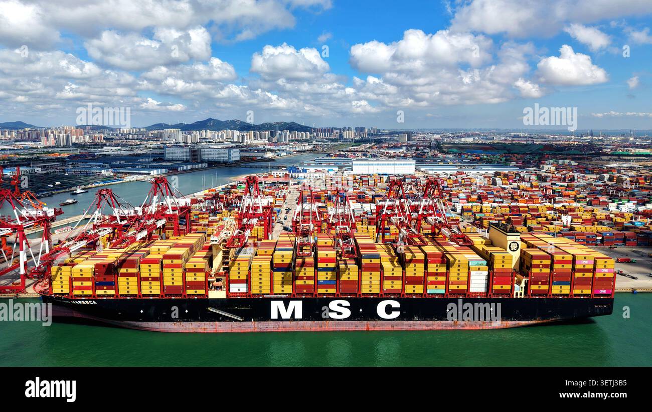 QINGDAO, CHINA - JUNE 23, 2026 - A cargo ship was loaded and unloaded ...
